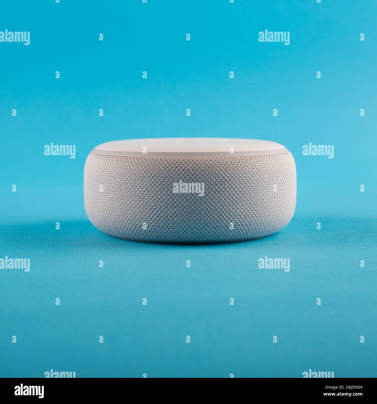 white digital voice assistant on light blue background Stock Photo - Alamy