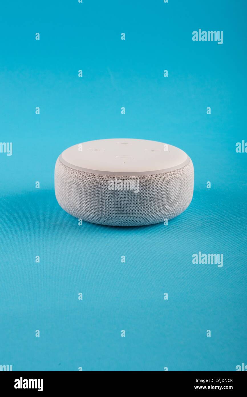 white digital voice assistant on light blue background Stock Photo - Alamy