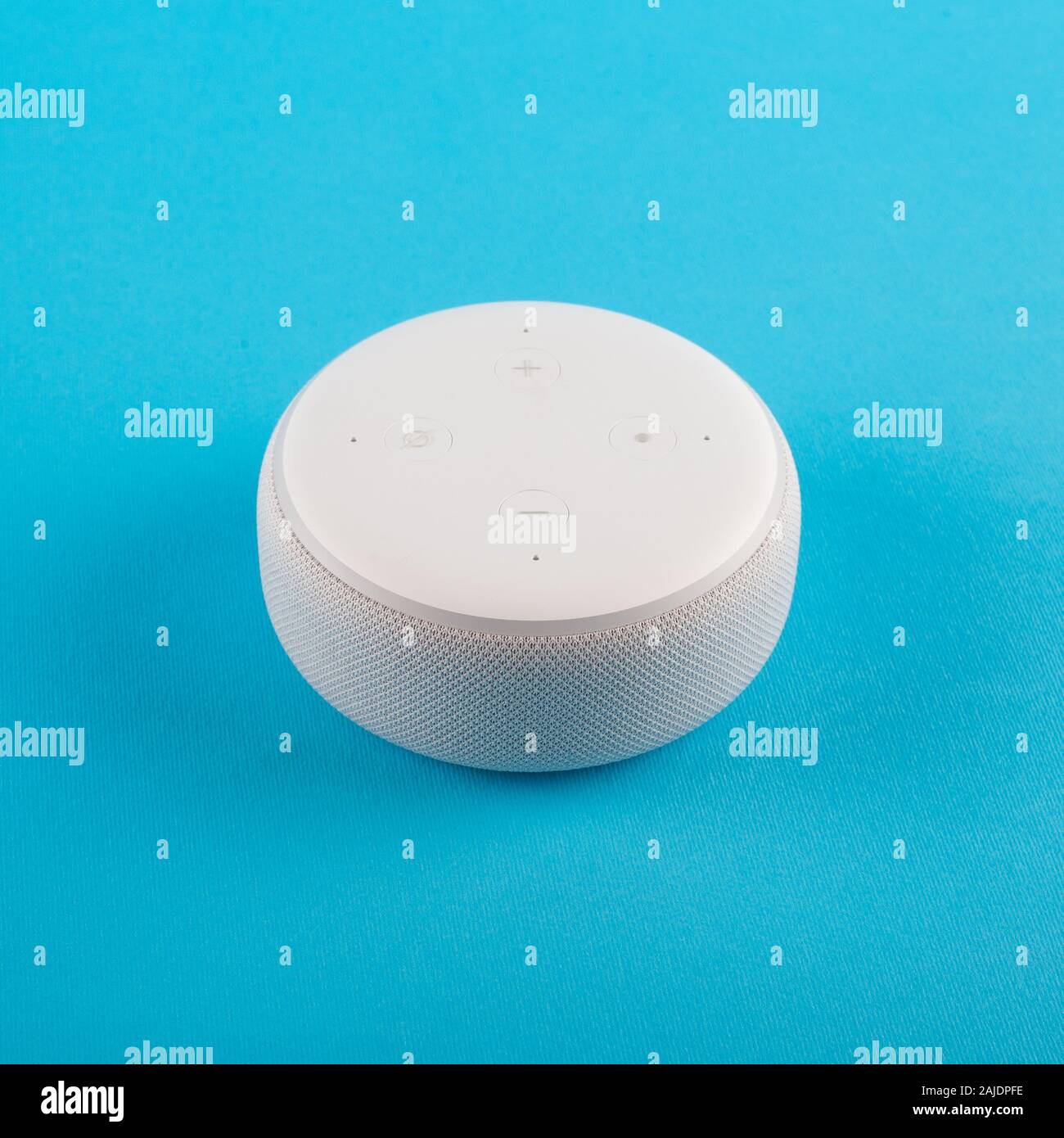white digital voice assistant on light blue background Stock Photo - Alamy