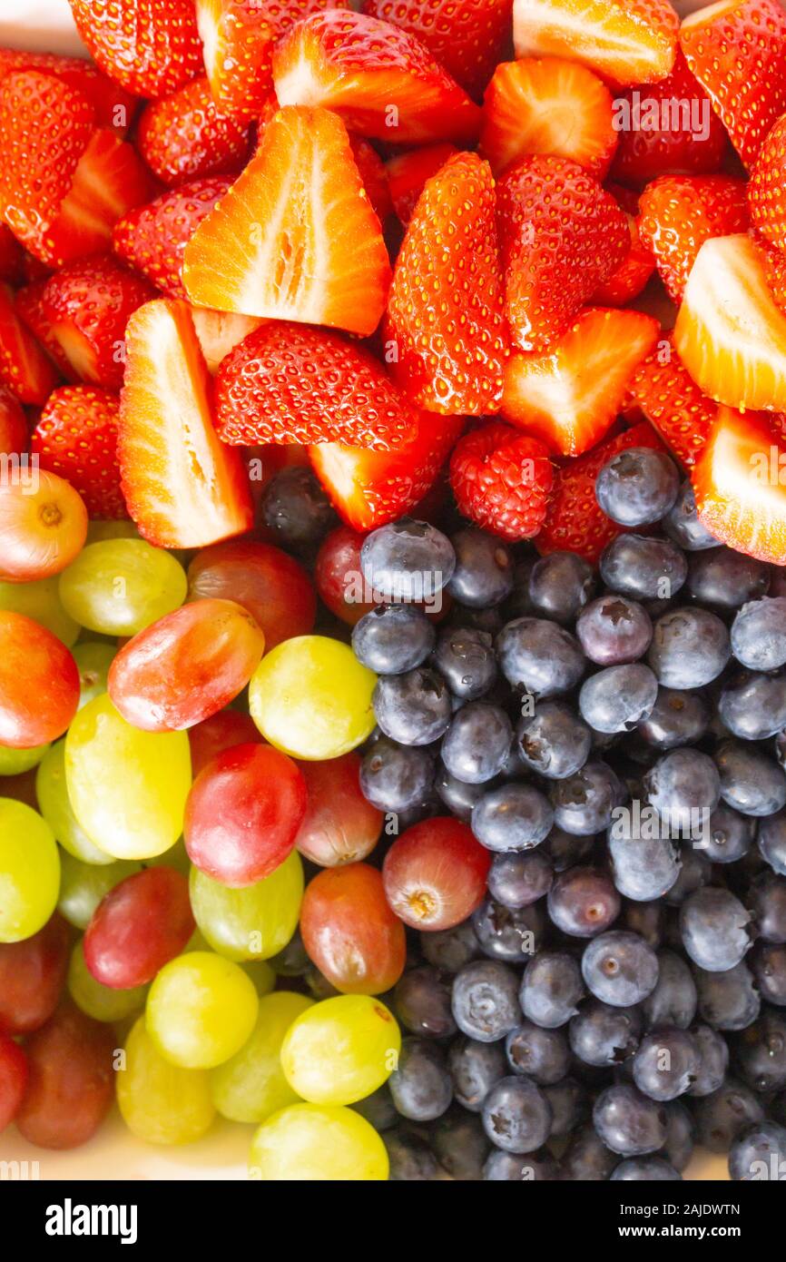 Selection prepared breakfast fruits and berries togeher in colorful ...