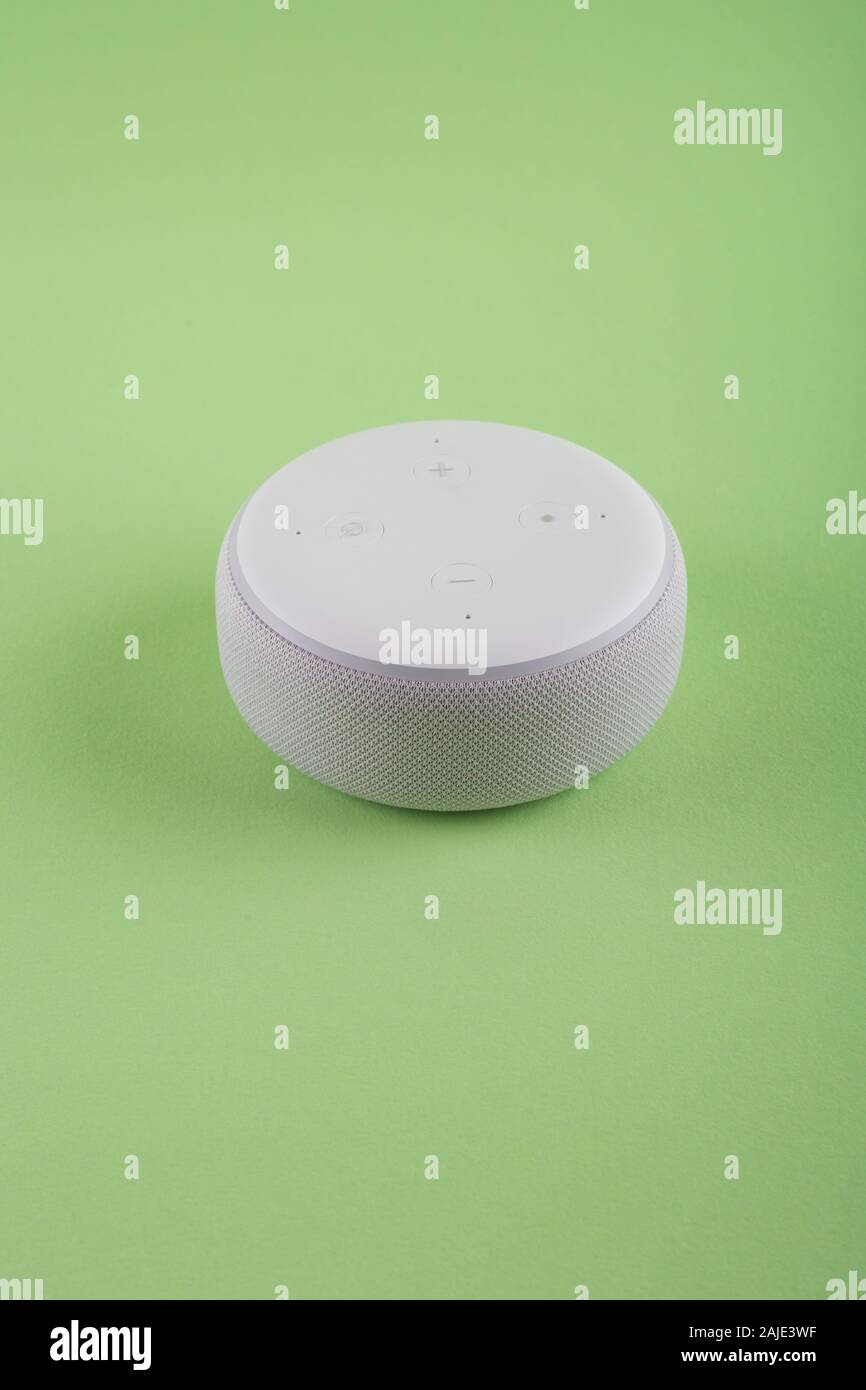 white digital voice assistant with green background Stock Photo - Alamy