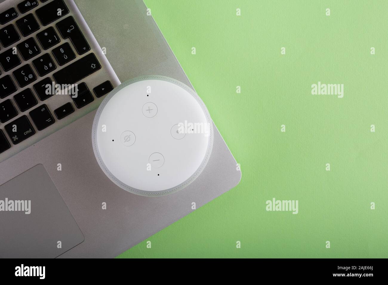 white digital voice assistant with computer on green background Stock ...
