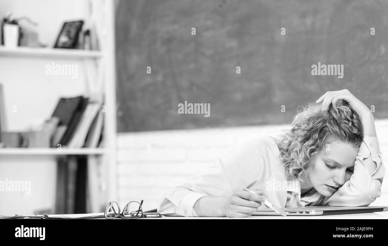 Tired tutor fall asleep at workplace. Tired student lean on desk ...