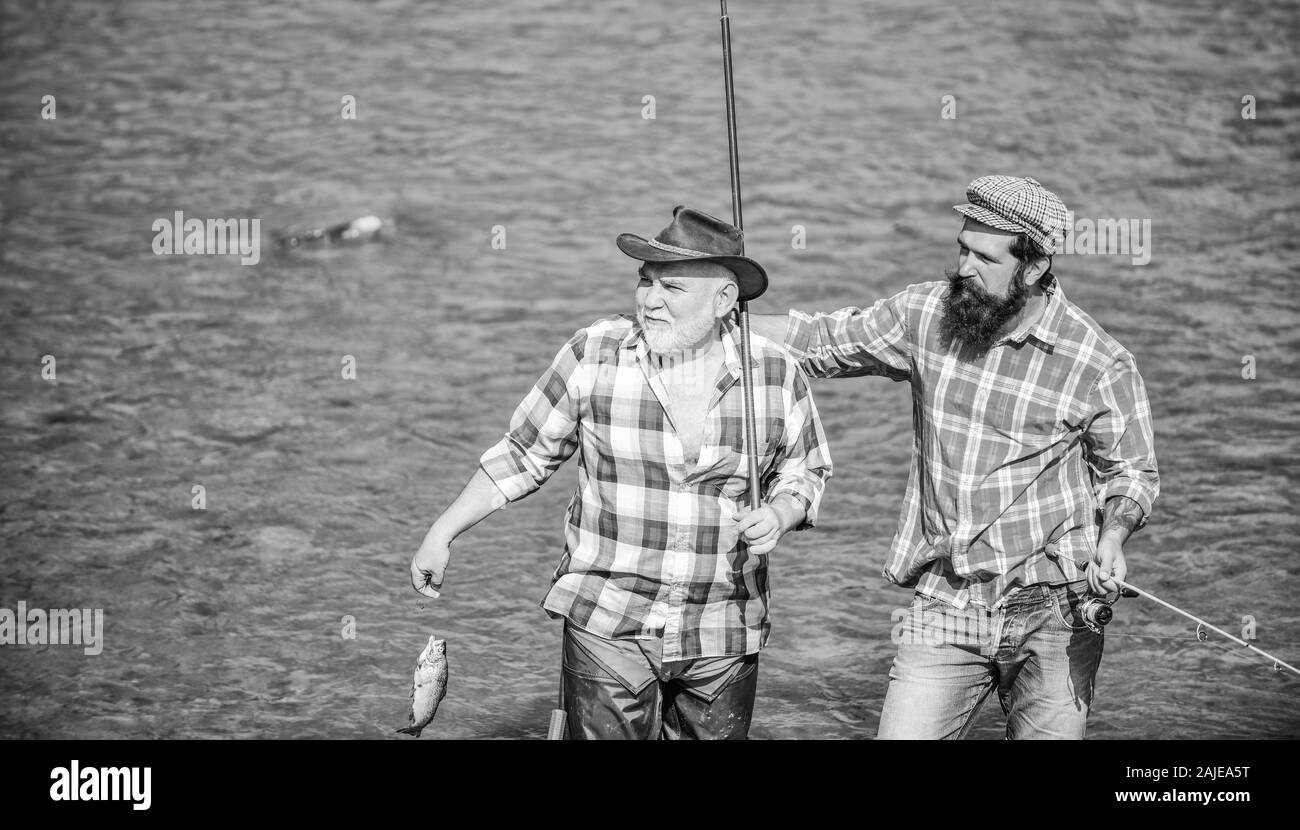 Happy fisherman with fishing rod and net. Hobby and sport activity ...
