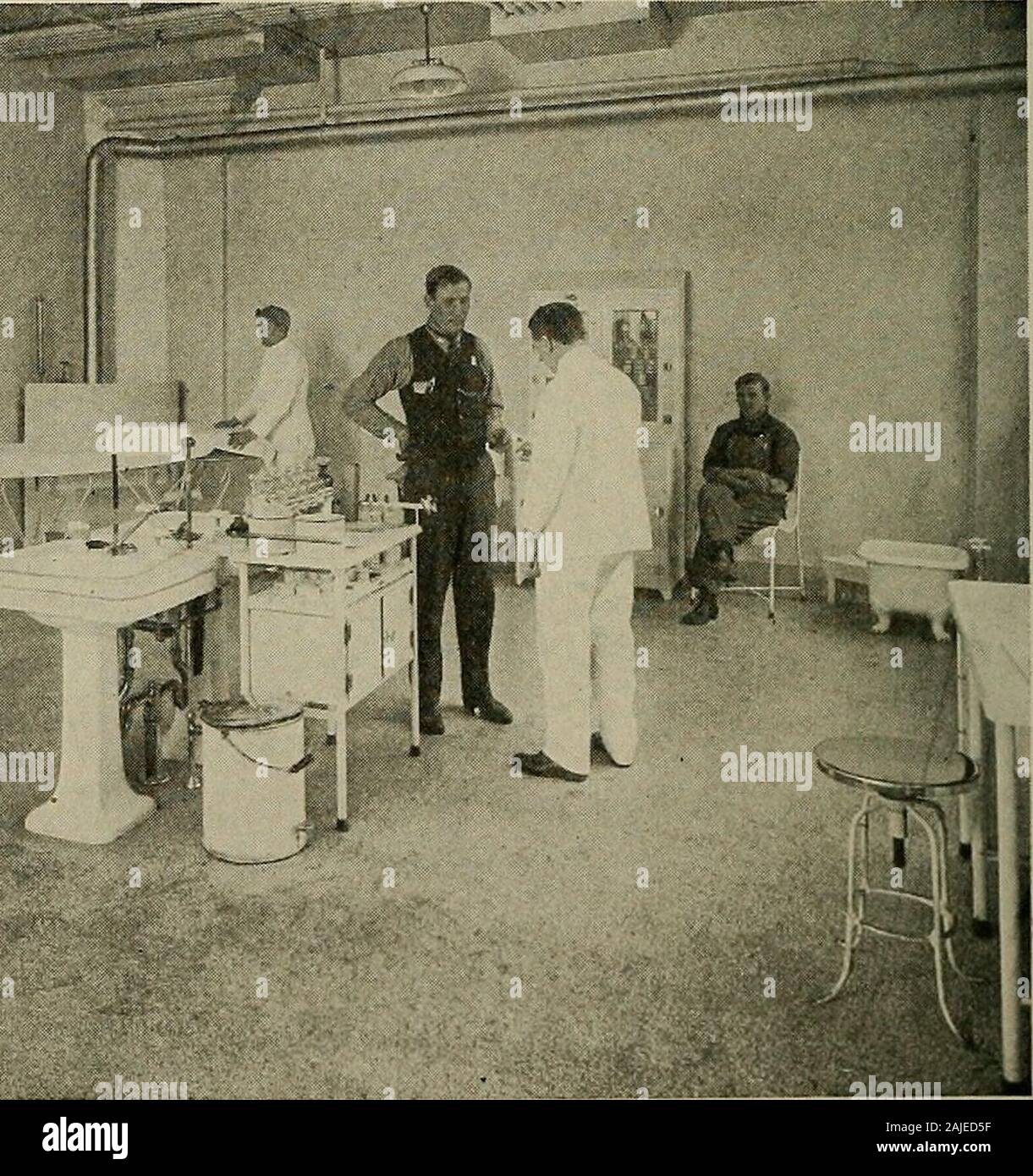 Industrial medicine and surgery . Fig. 73.—A first aid station in the ...