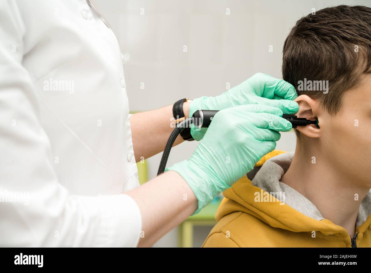 Preventive examination of a teenage boy in a medical facility Stock ...