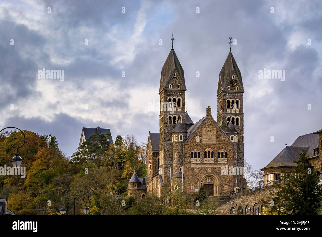 Stone facade of the neo romanesque Roman Catholic Church of Saints Come ...