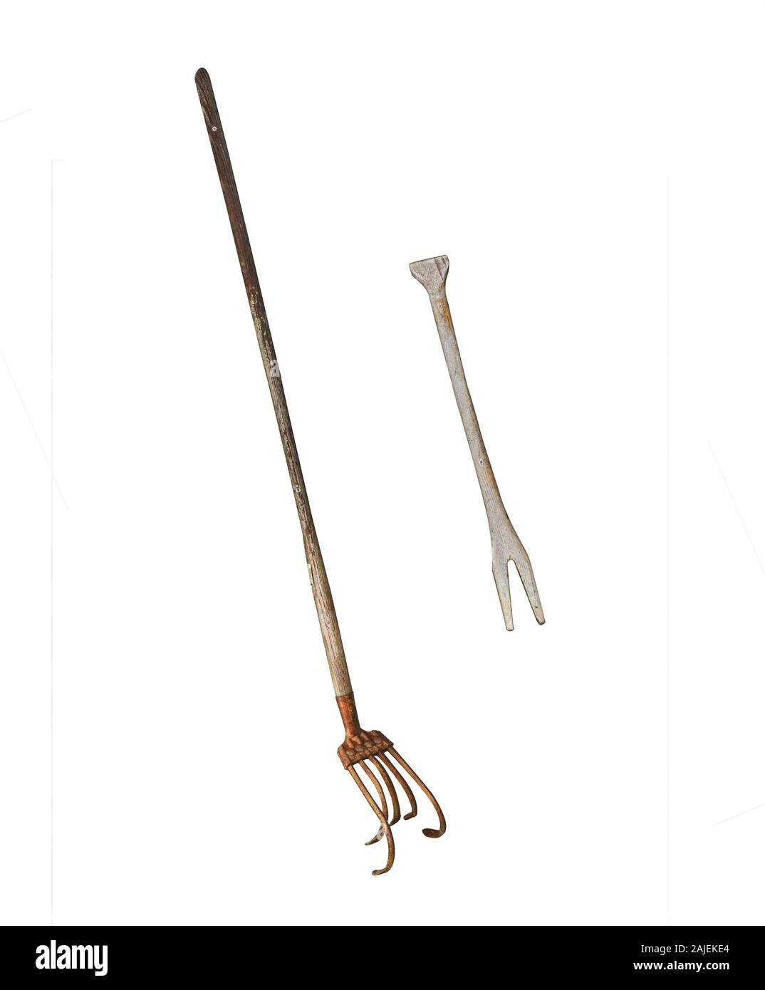 Old-fashioned rusty and well-used tools and farm equipment, isolated on ...