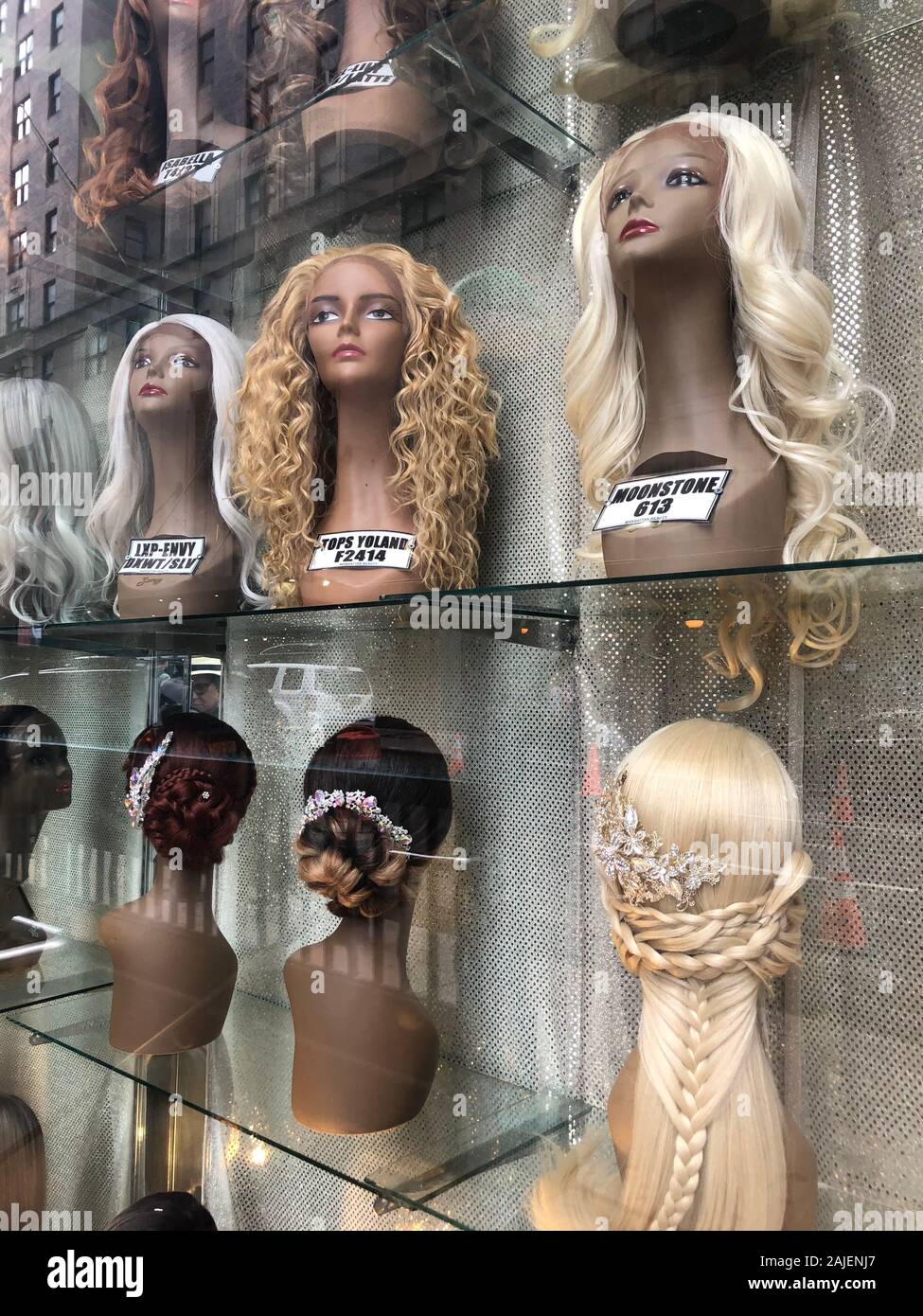 Wig shop window display hair hi-res stock photography and images - Alamy