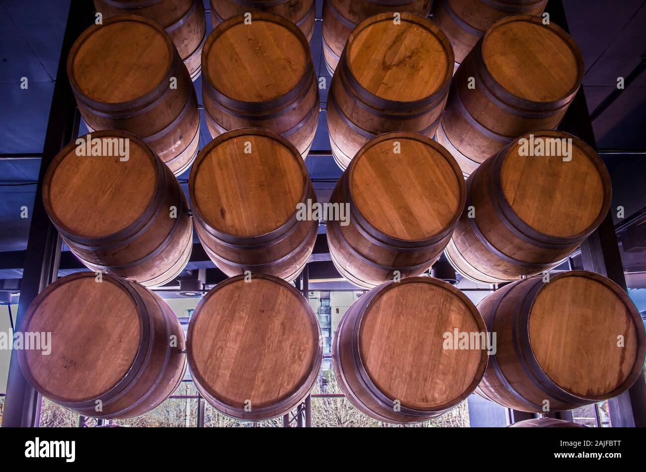 Wooden barrels with wine. Traditional wine storage photo Stock Photo ...