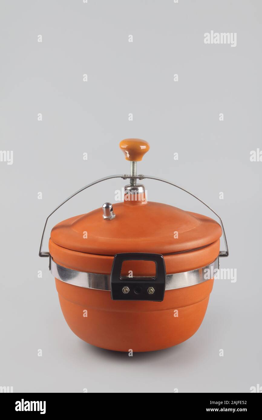 Indian made clay pressure cooker Stock Photo - Alamy