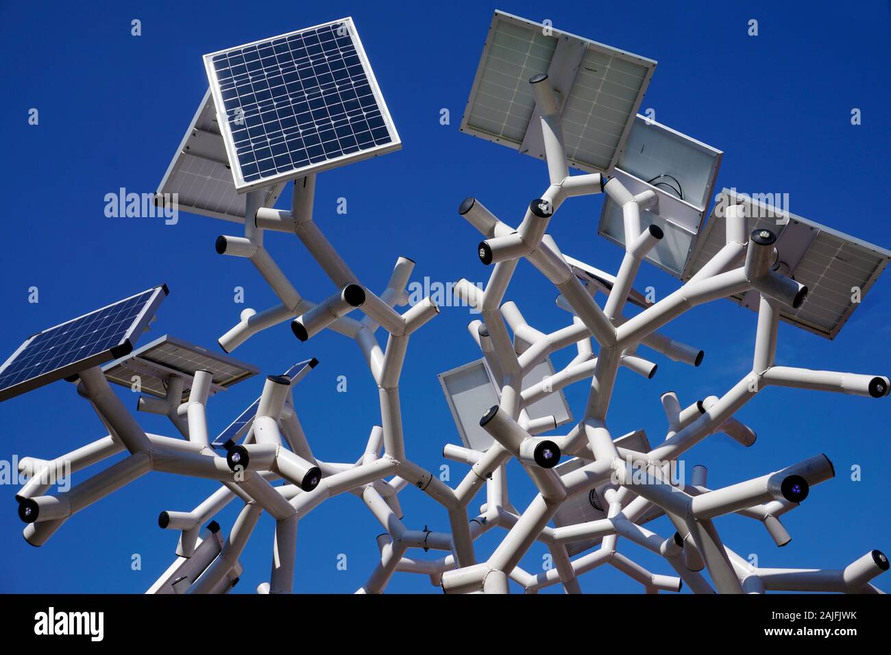 Smart charging solar panels tree. The tree uses energy stored by the ...