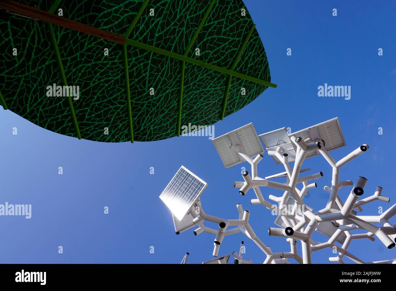 Smart charging solar panels tree. The tree uses energy stored by the ...