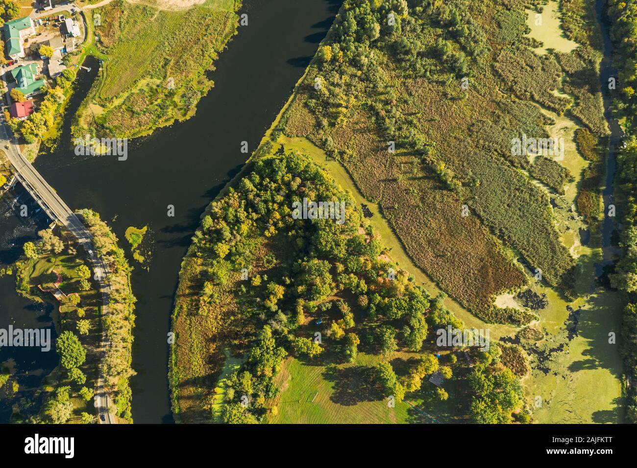 Aerial View Of Town And River Marsh Landscape In Sunny Summer Day. Top ...