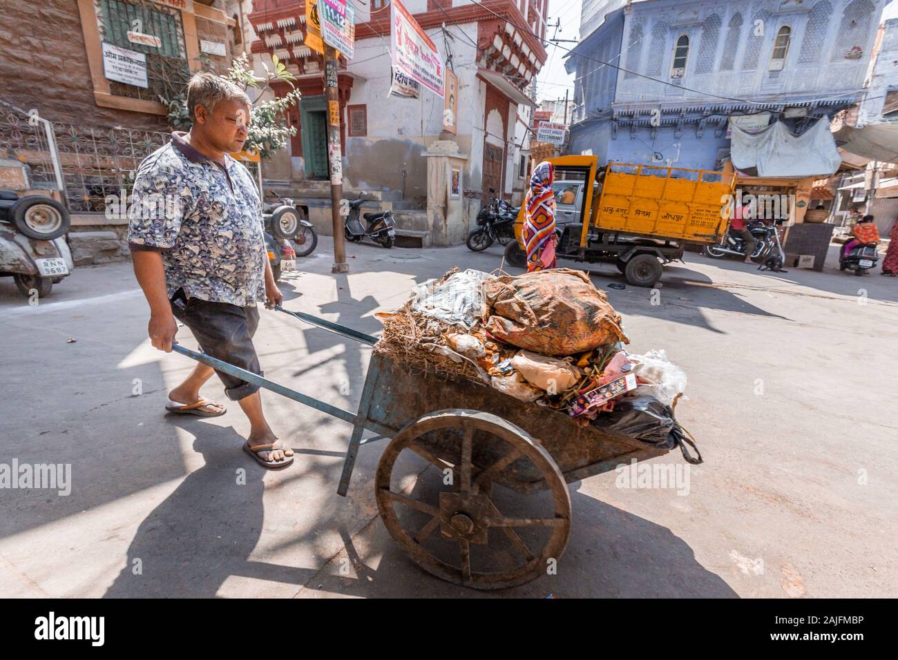 Jodhpur, India - March 07 2017: Man takes garbage in the cart Stock ...