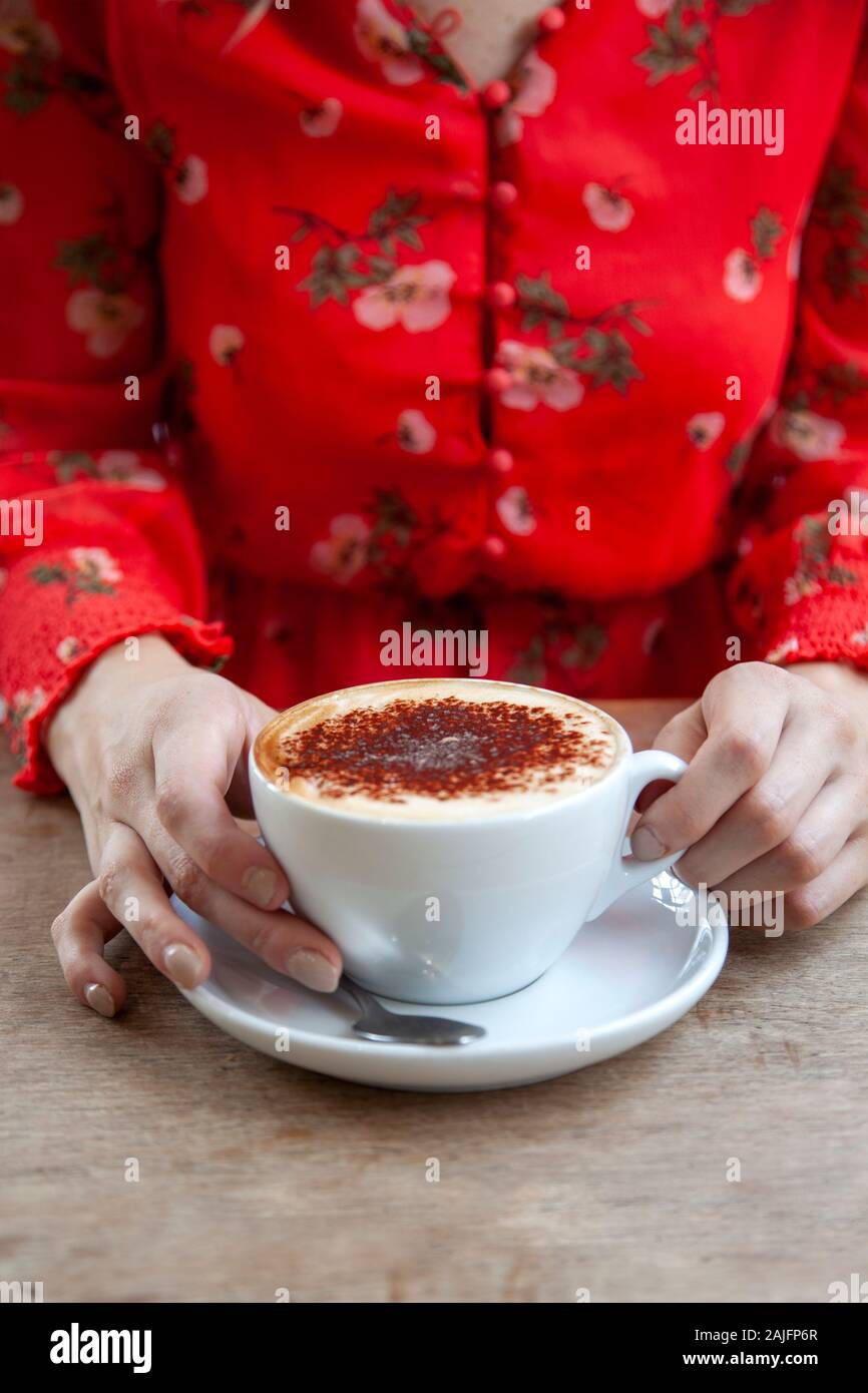 Hands around cup hi-res stock photography and images - Alamy
