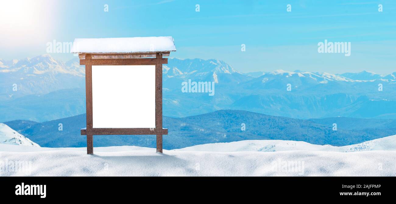 Ski resort sign, billboard mockup on a snowy mountain. Mountain peaks ...