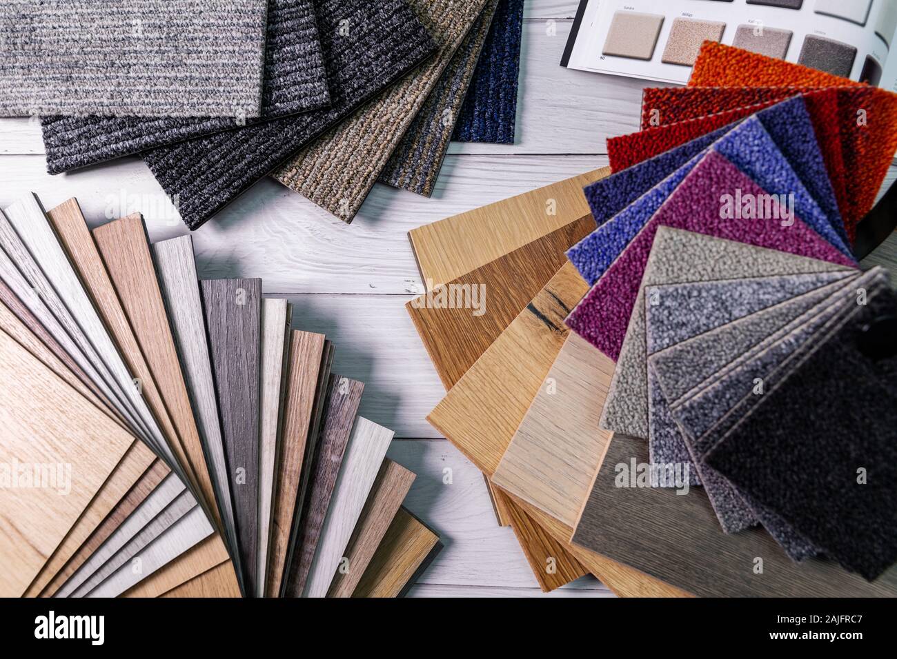 flooring and furniture materials - colorful floor carpet and wooden ...