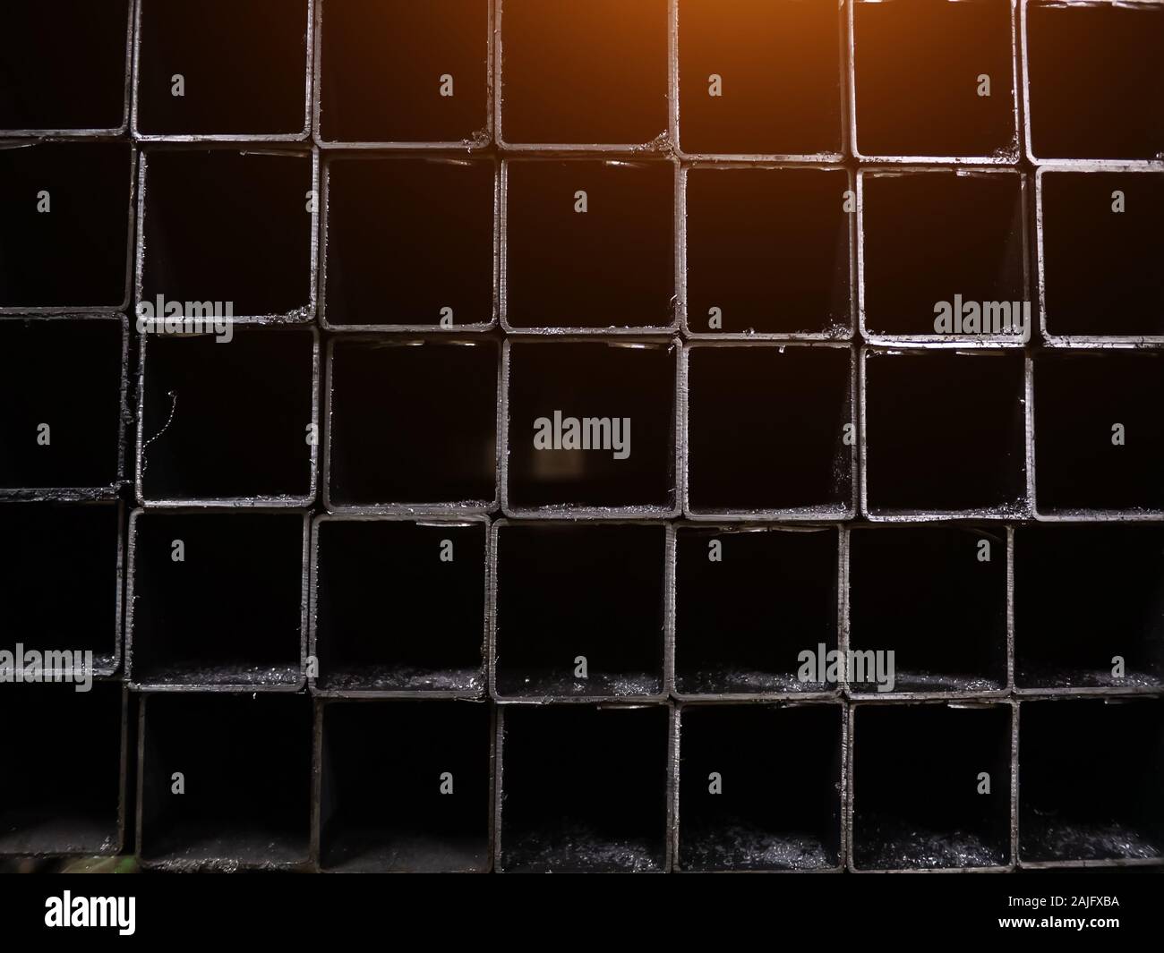 Construction steel profile pipe of rectangular shape at the warehouse ...