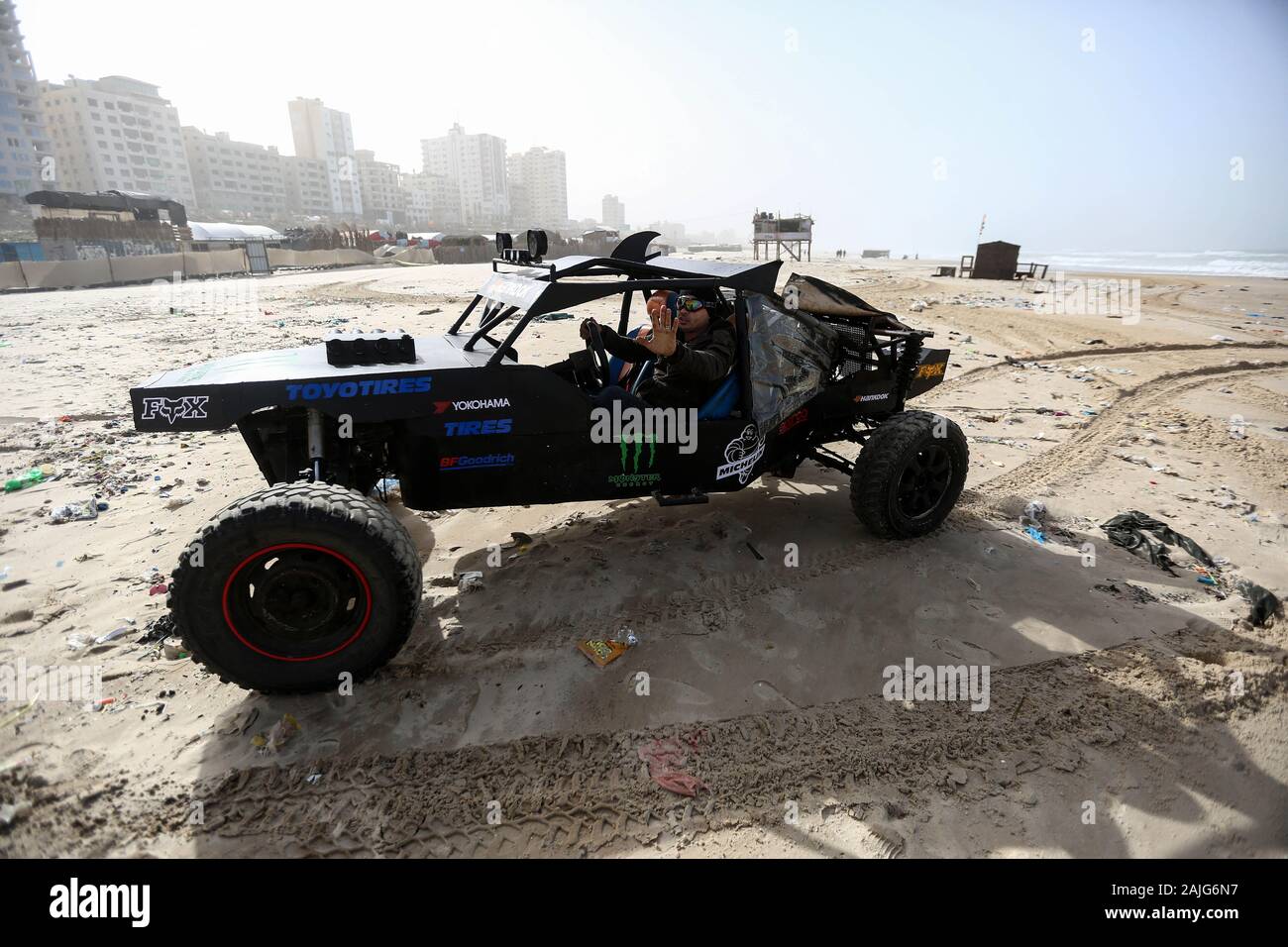 Gaza. 25th Dec, 2019. Mohammed al-Dabba drives his buggy at the beach ...