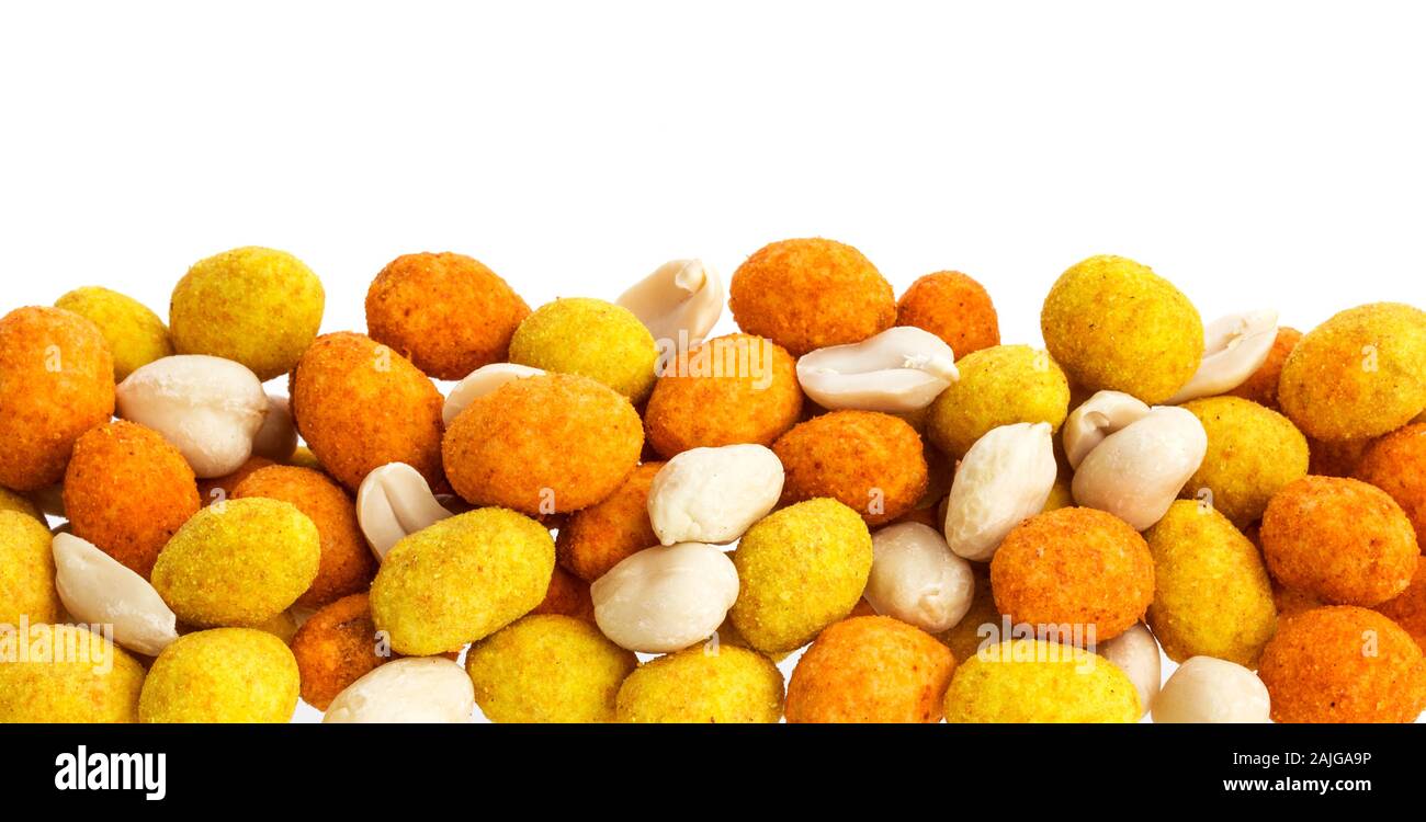 Heap of coated peanuts isolated on white background with clipping path ...