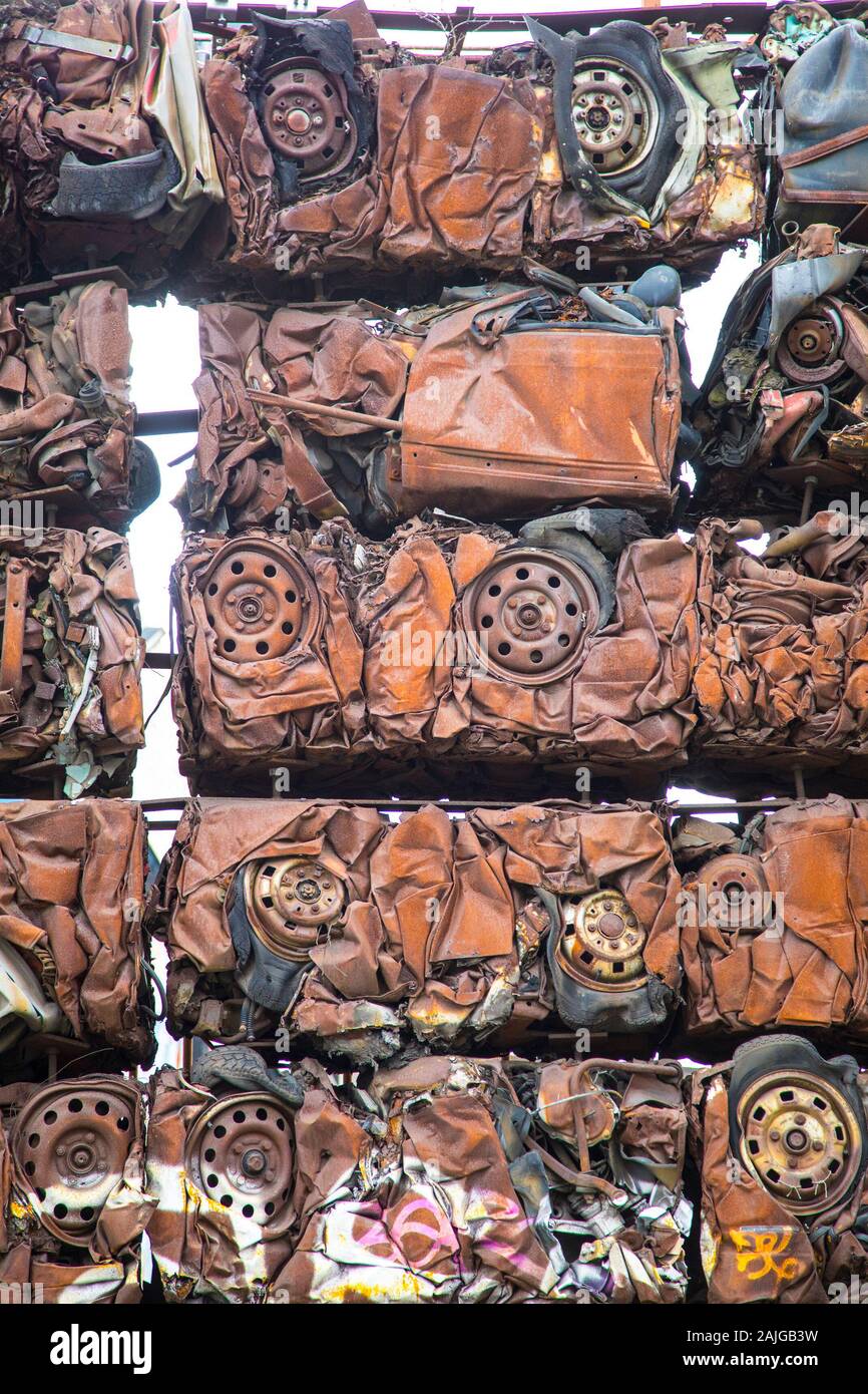 crushed cars used as wall at the entrance to the Custard Factory car ...