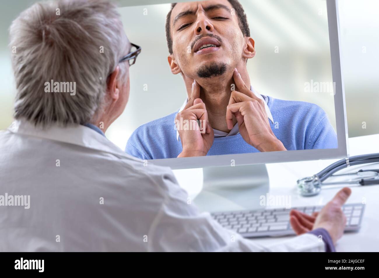 Doctor with a stethoscope on the computer laptop screen. telemedicine ...
