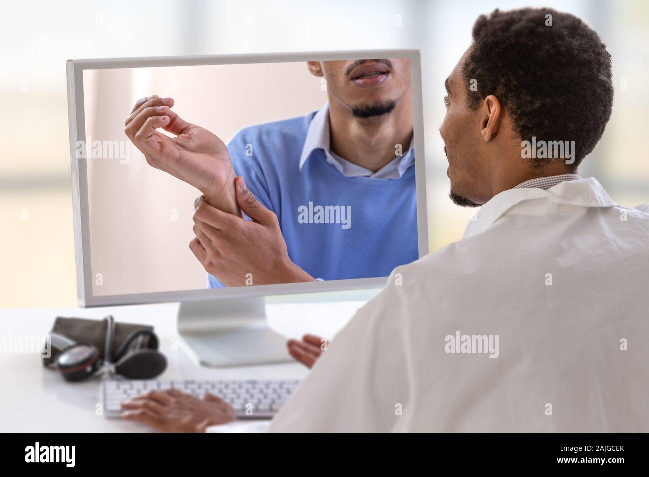 Doctor with a stethoscope on the computer laptop screen. telemedicine ...