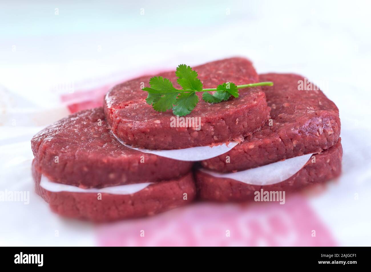 Chopped meat on white background. bloody, food Stock Photo - Alamy