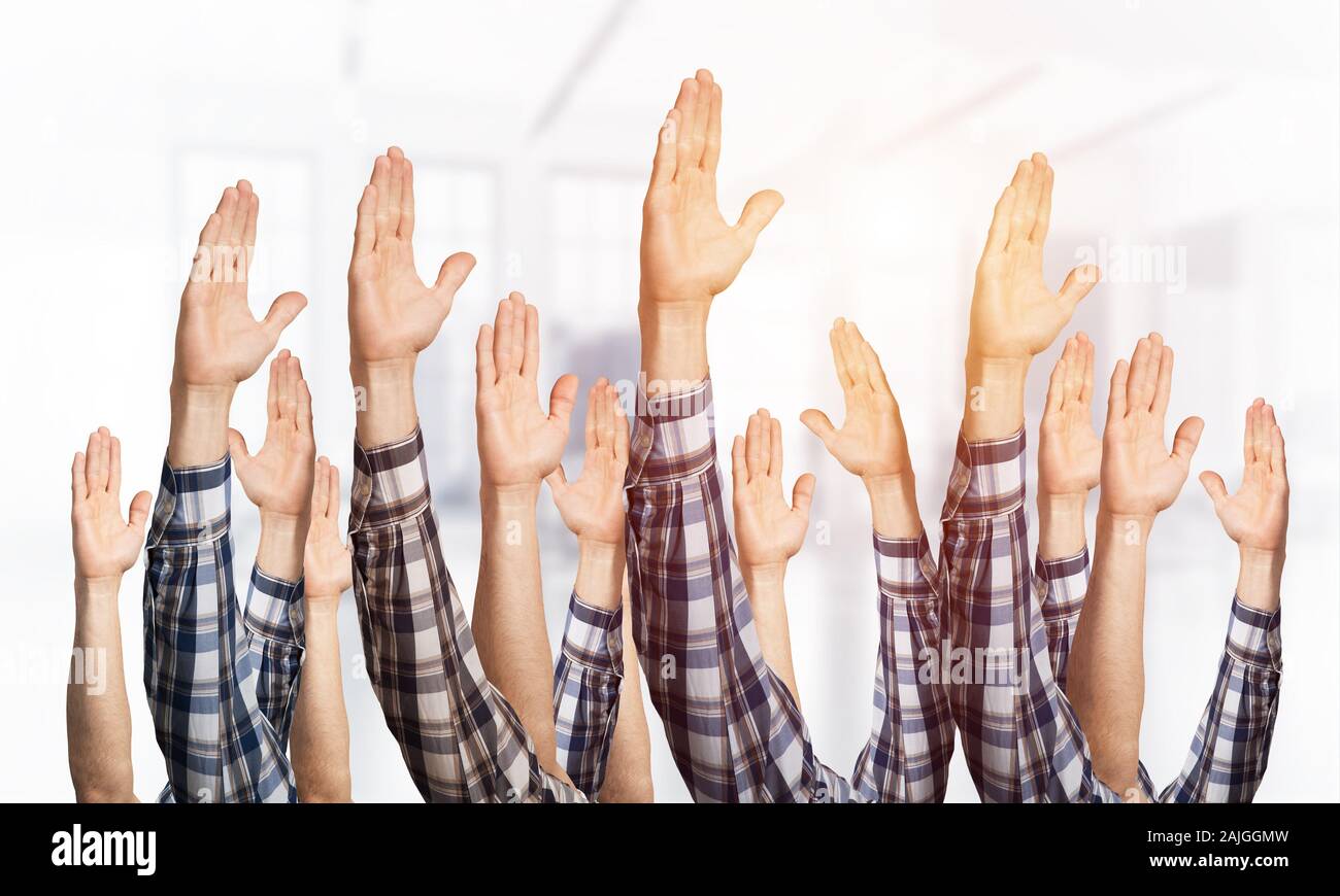 Hands rais hi-res stock photography and images - Alamy