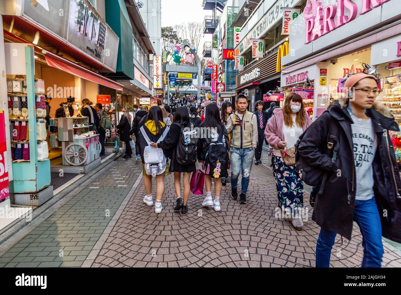TOKYO, JAPAN - FEBRUARY 7, 2019: Unidentified people walk along ...