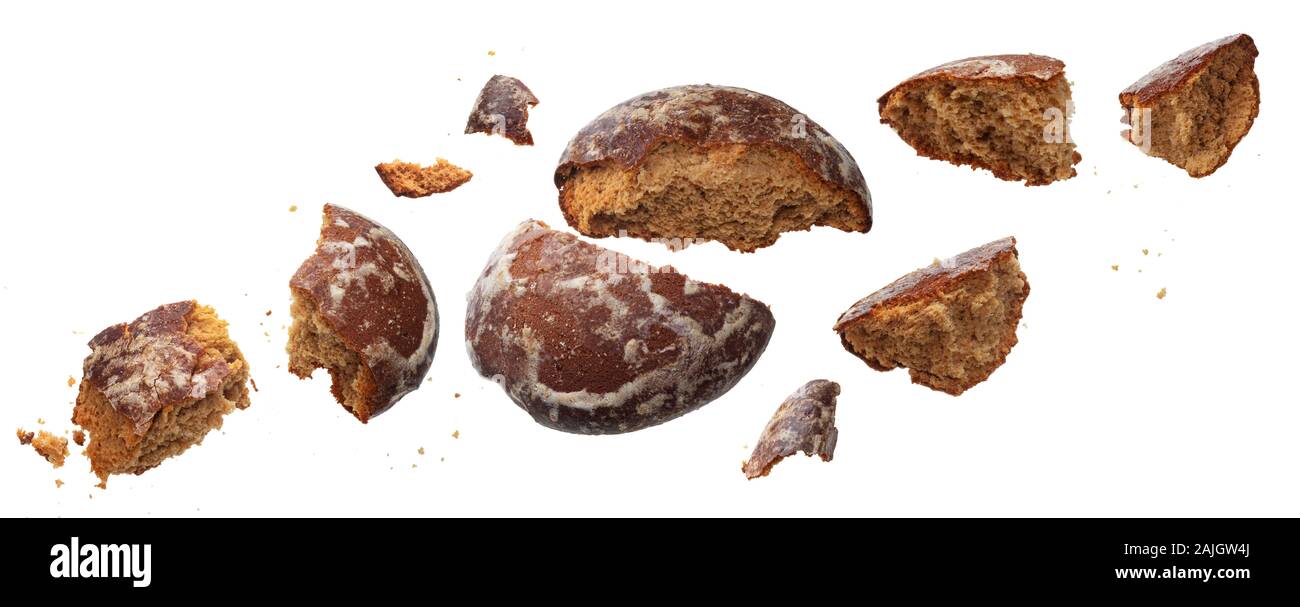 Falling broken gingerbread isolated on white background with clipping ...