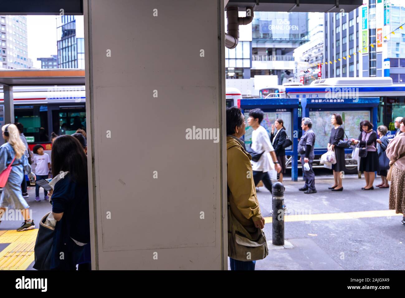 Tokyo/Japan - 10/25/19 - People waiting outside the train station in ...