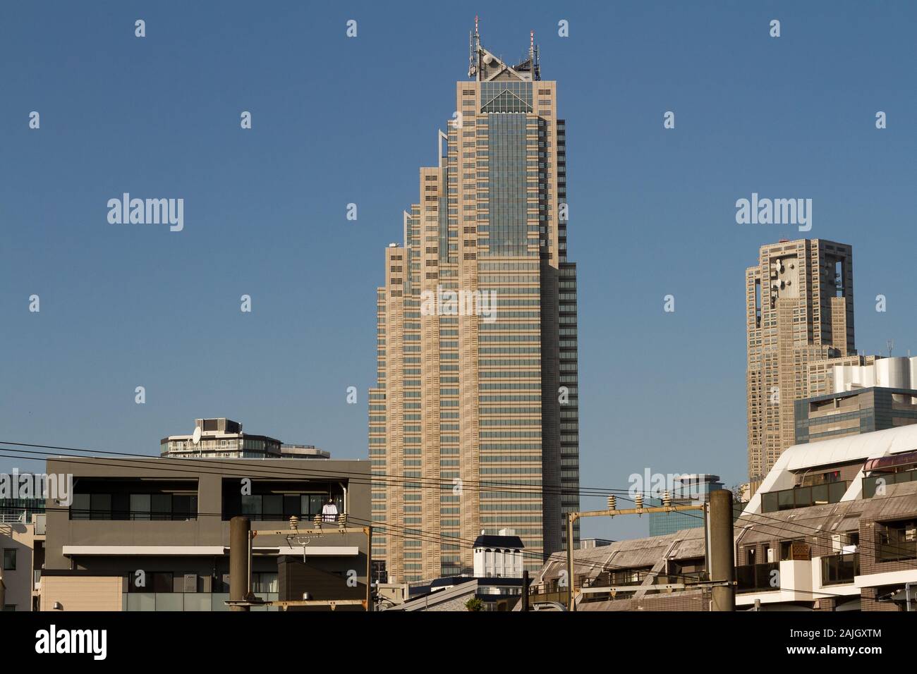 The towers of the Tokyo Metropolitan Government building (right) and ...