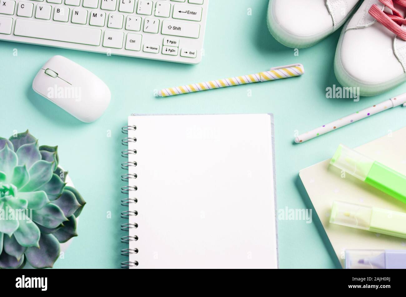 Mint back to school flat lay frame with notepad Stock Photo - Alamy