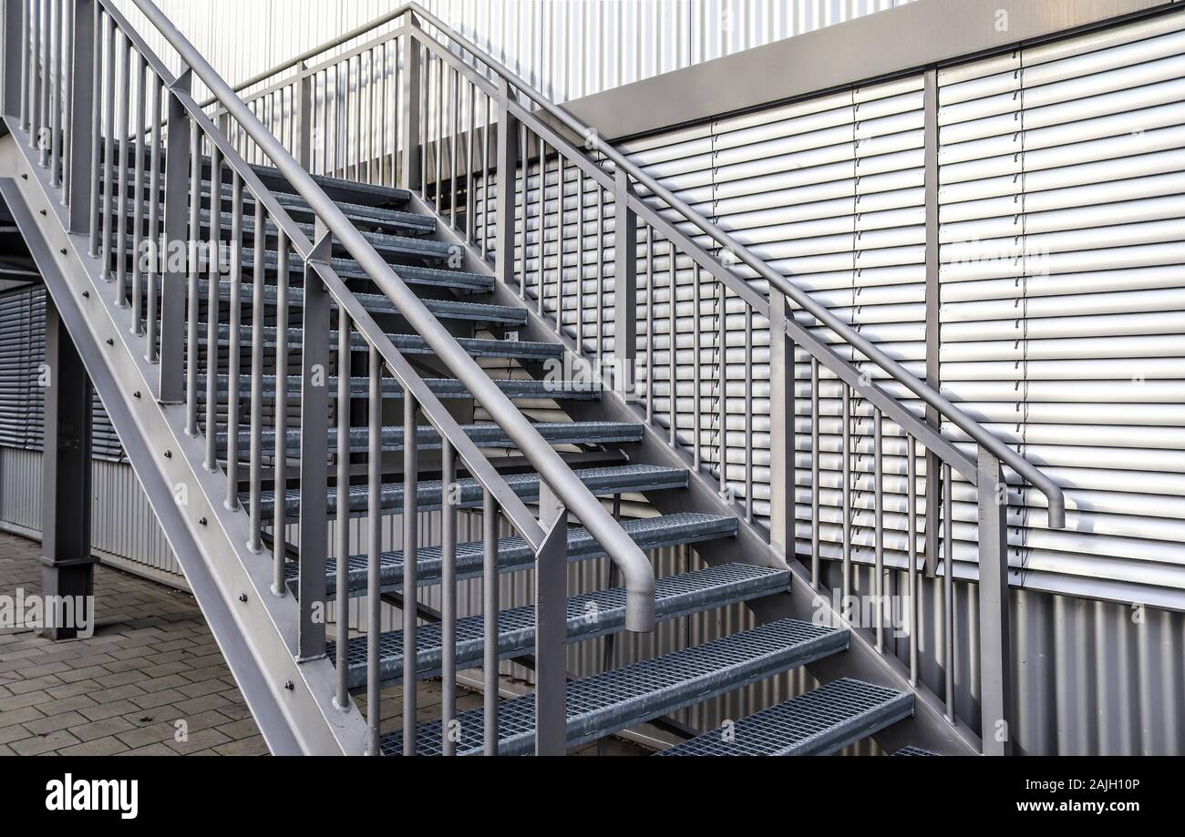 Close up view on metallic stairs at a modern architecture building ...