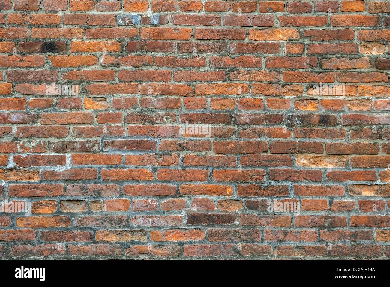 Weathered old red brick background with rough surface Stock Photo - Alamy