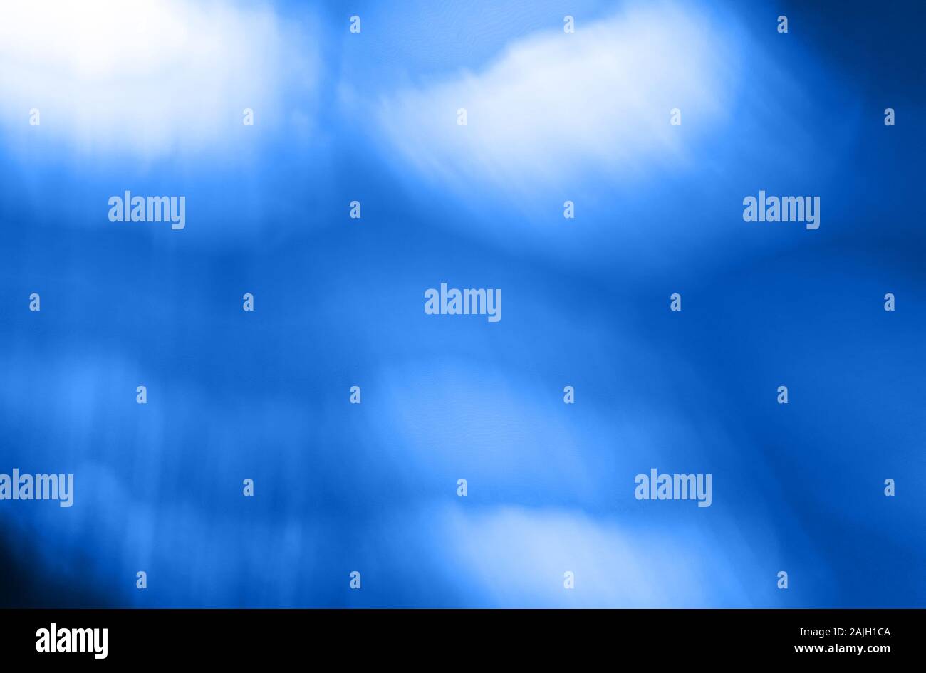 Classic blue abstract glowing light background Stock Photo - Alamy