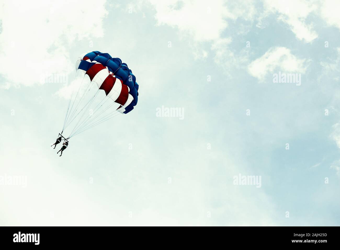 Parachute ride two friends Mexico Stock Photo - Alamy