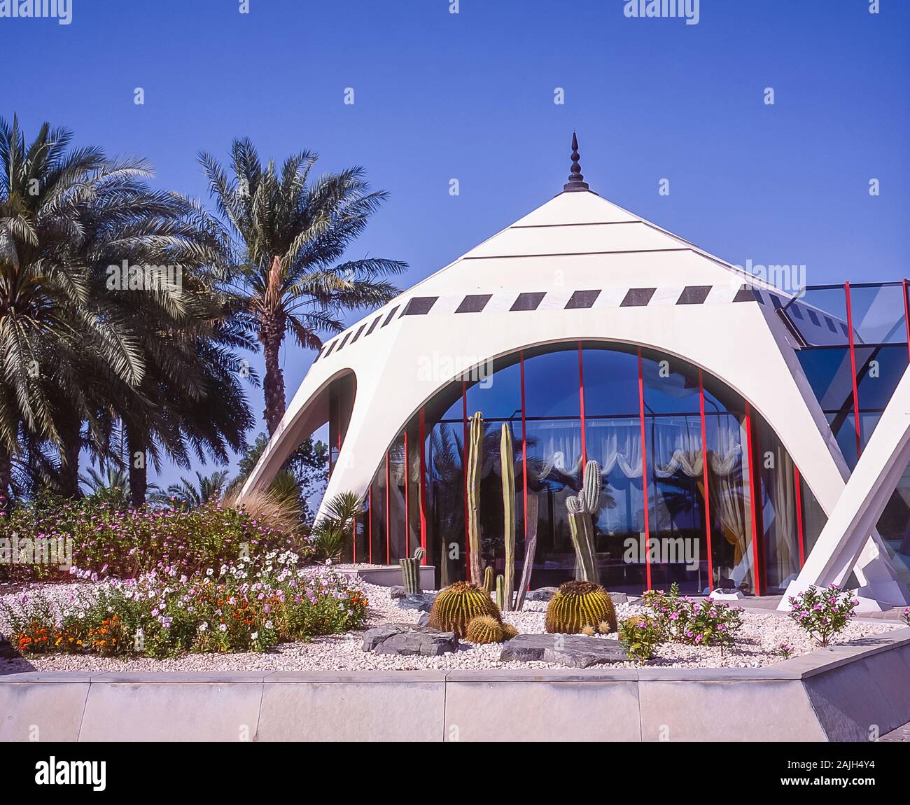 The Dubai Emirates Golf Club with themed architecture to resemble ...
