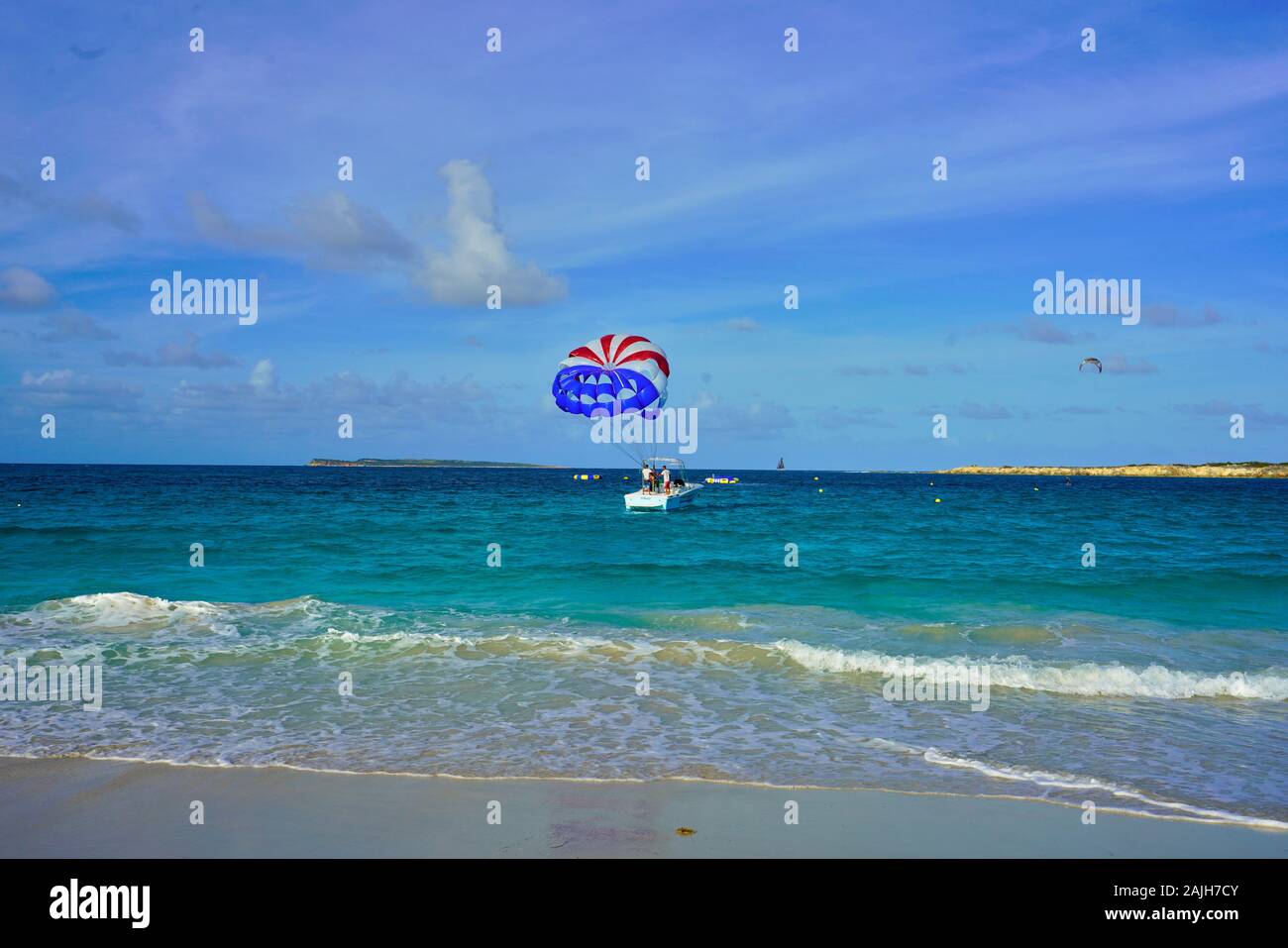 Beautiful beach day with rainbow color sky Stock Photo - Alamy