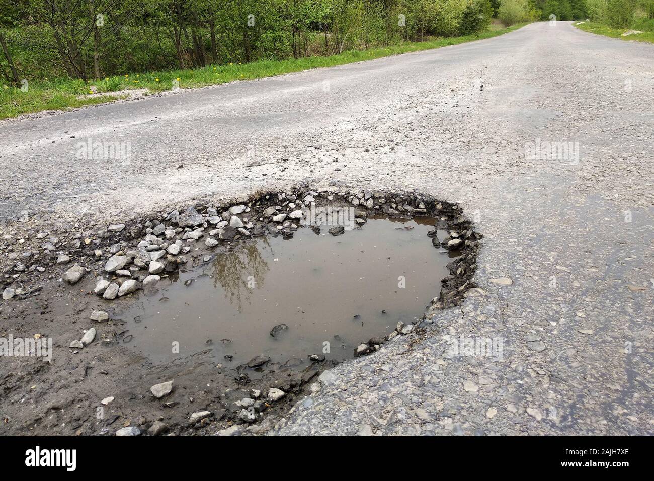 Pothole full of water hi-res stock photography and images - Alamy