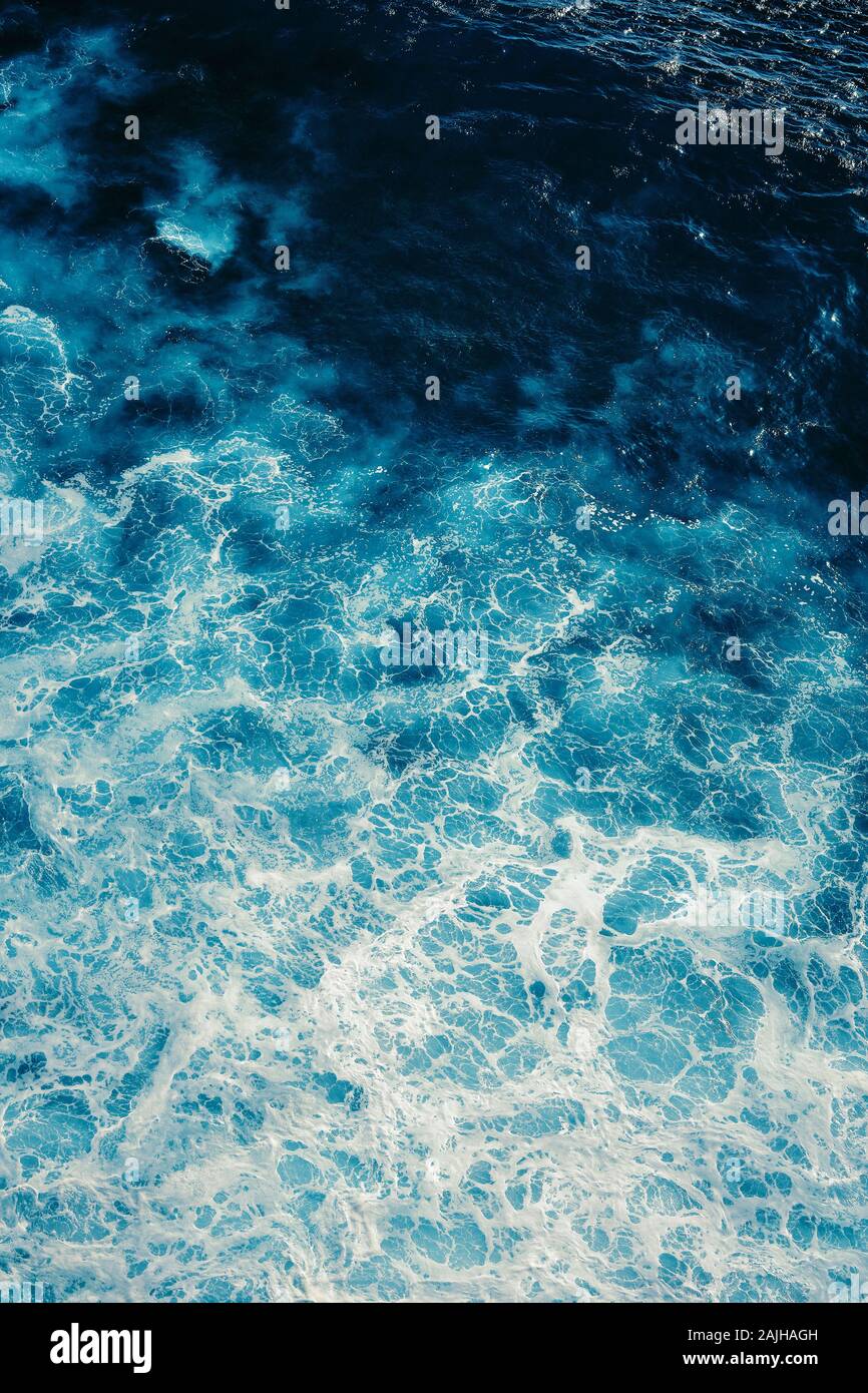 Aerial view to ocean waves. Blue water background Stock Photo - Alamy