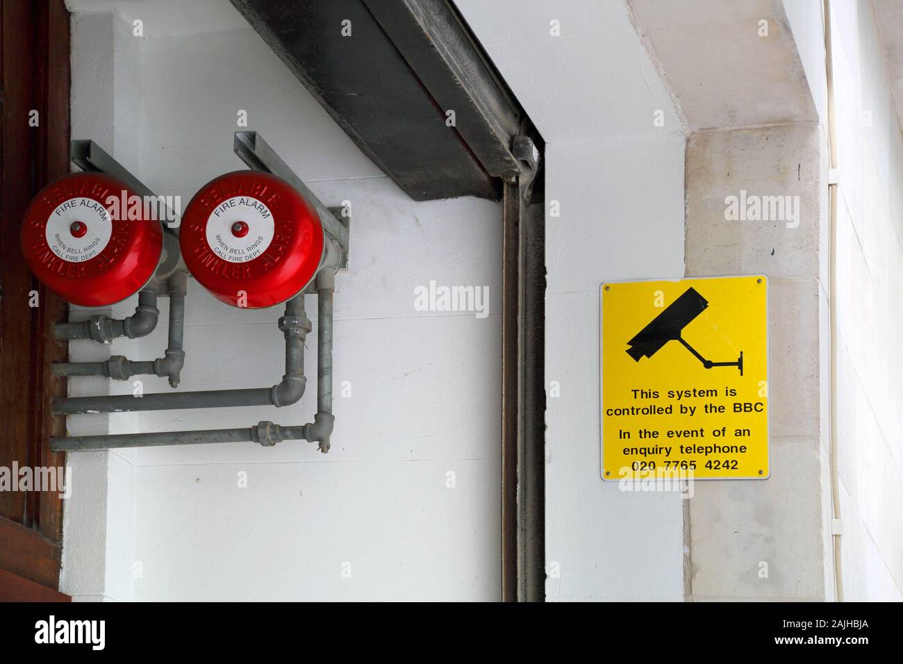 cctv camera warning sign at broadcasting house london Stock Photo - Alamy