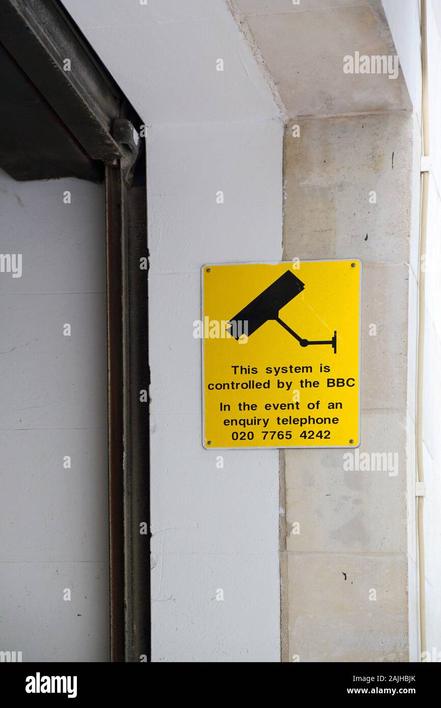 cctv camera warning sign at broadcasting house london Stock Photo - Alamy
