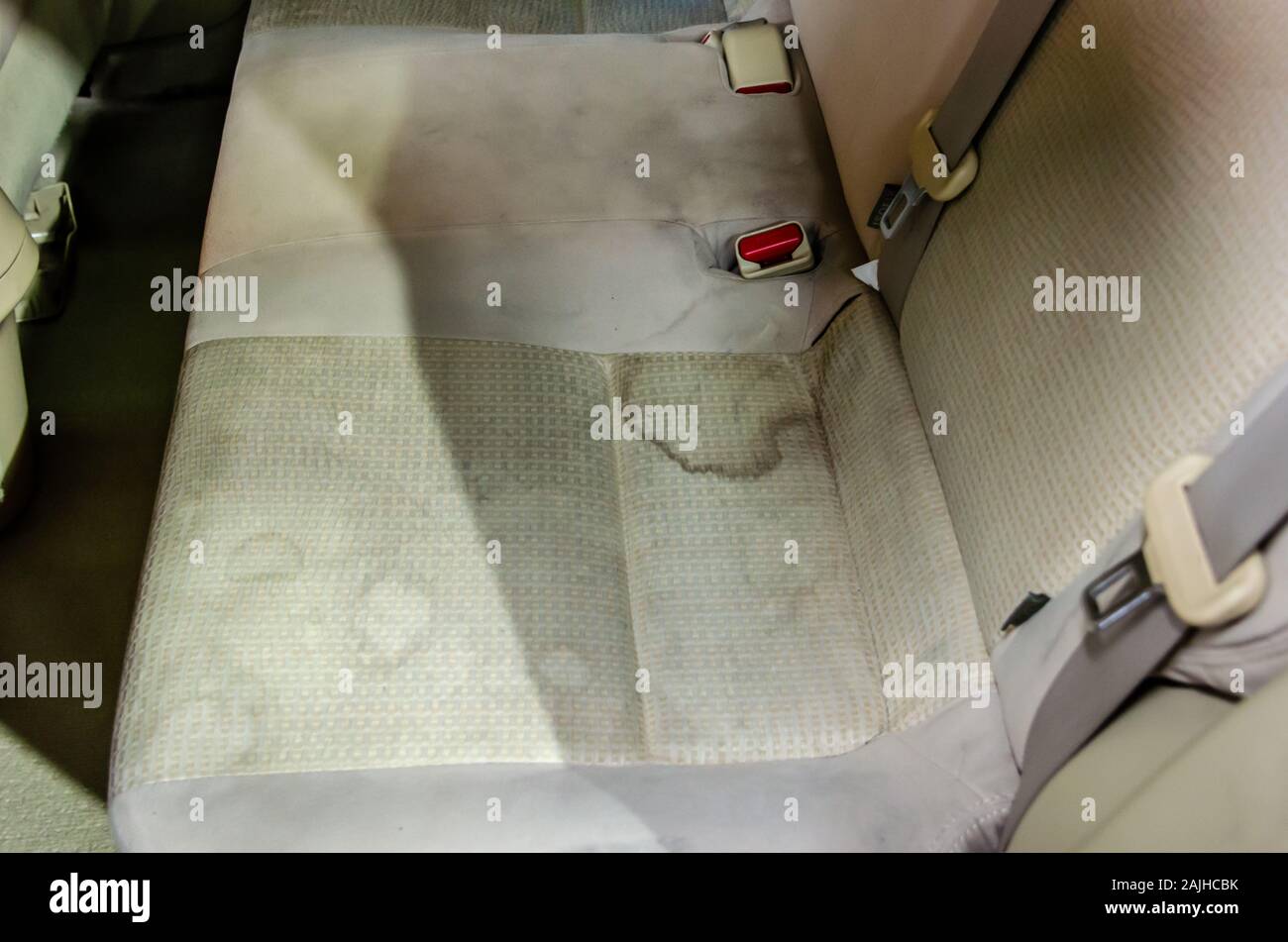 Dirty on the seat inside the car Stock Photo - Alamy