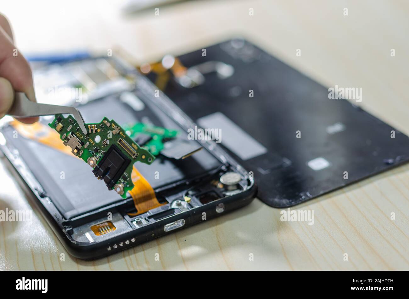 Change the mobile phone electronics circuit board Stock Photo - Alamy