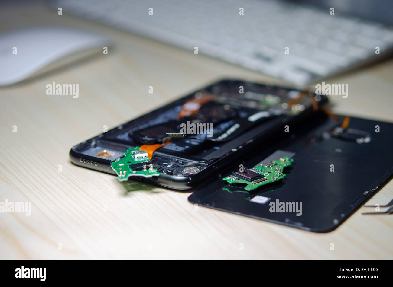 Repair and replacement of battery hi-res stock photography and images ...