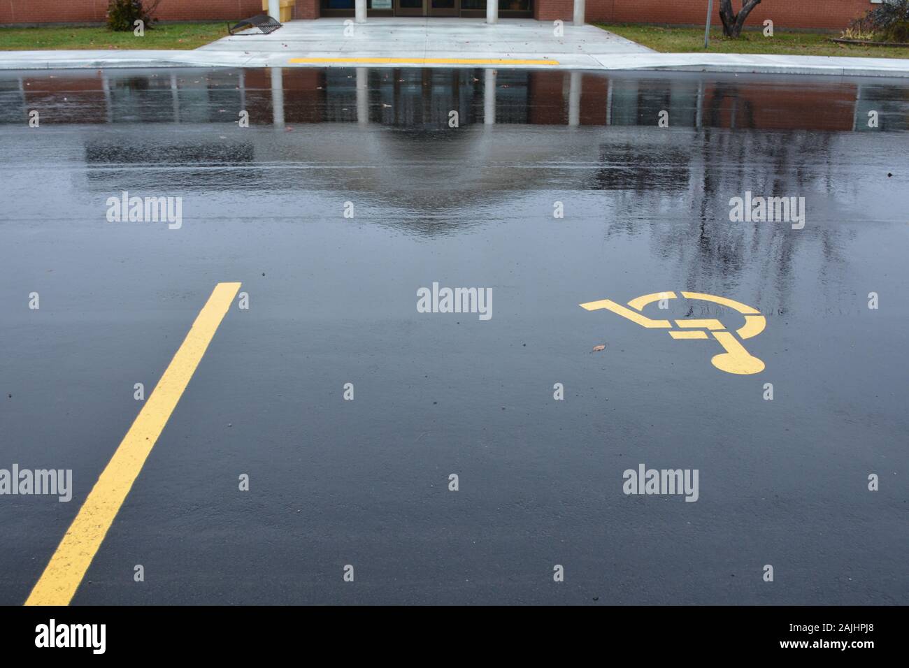 Rain in wet school parking lot Stock Photo - Alamy