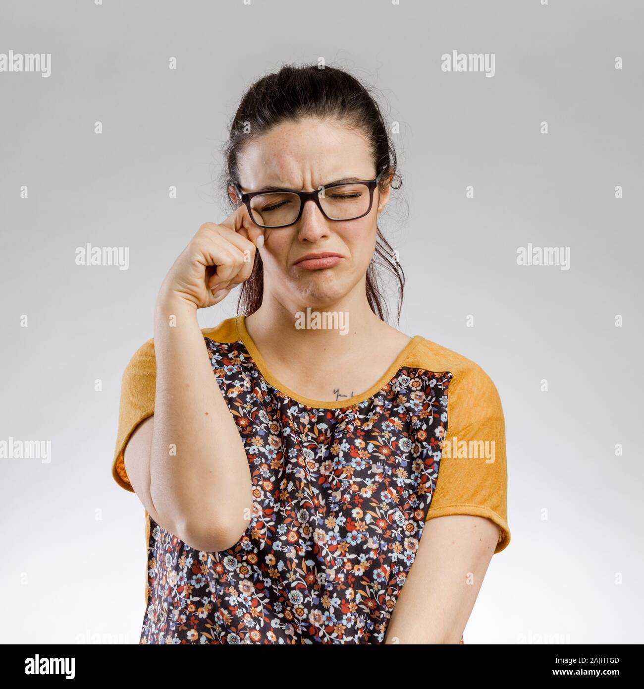 Portrait of a cute woman crying Stock Photo - Alamy